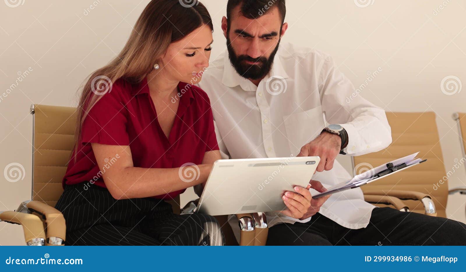 Man Helps Female Fill Out Form Submitting Documents at Work Stock ...