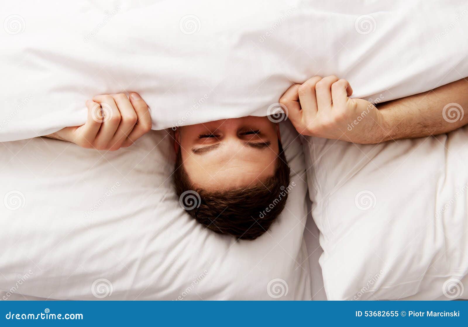 Man Hiding in Bed Under Sheets. Stock Image - Image of expression ...
