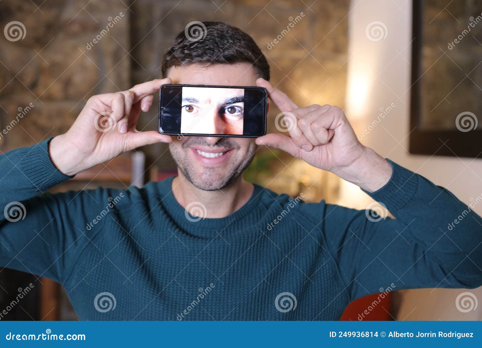 Man Hiding Behind Mobile Phone Stock Photo - Image of phone, gadget ...
