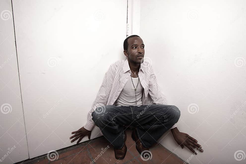 Man hiding in the corner stock photo. Image of fearful - 10019058