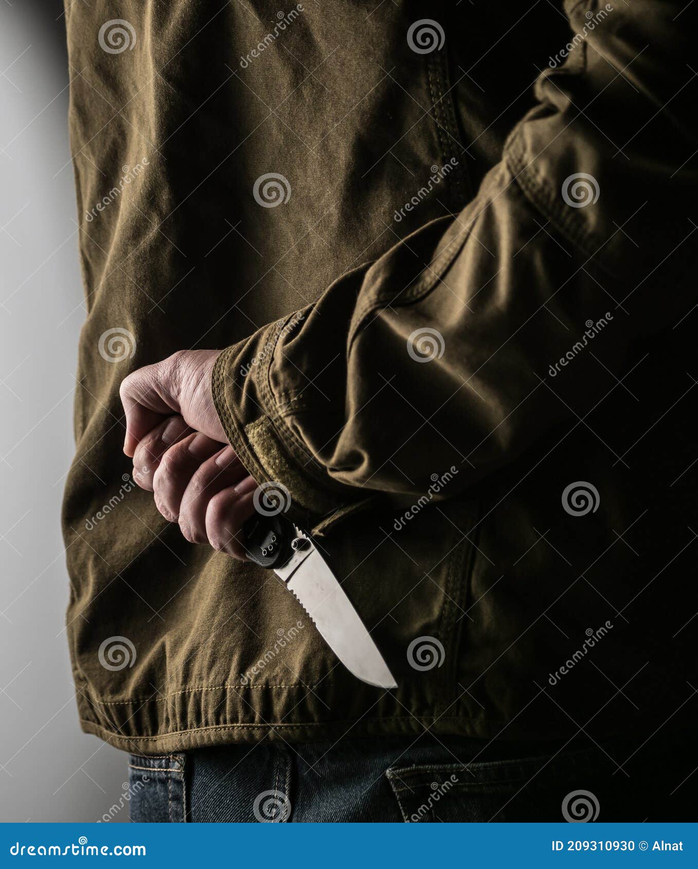 Man Holding a Knife Behind His Back Stock Photo - Image of weapon ...