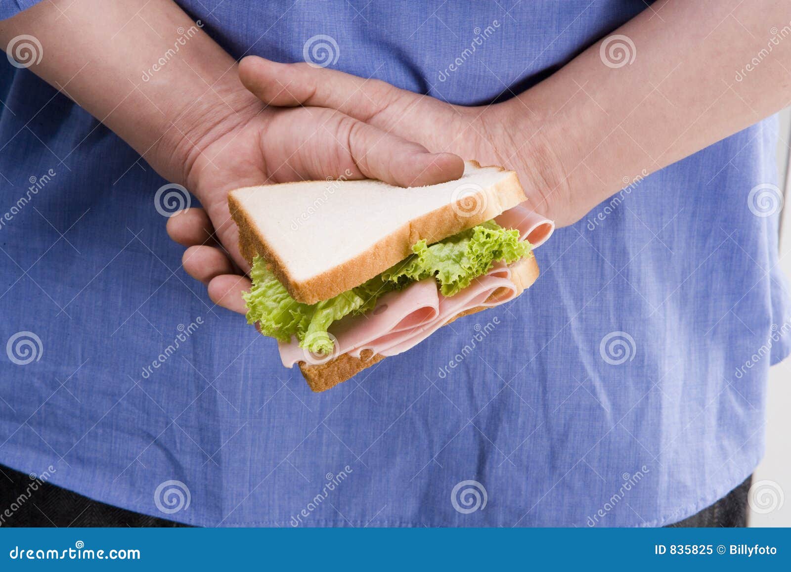 Man hiding sandwich stock image. Image of blue, person - 835825