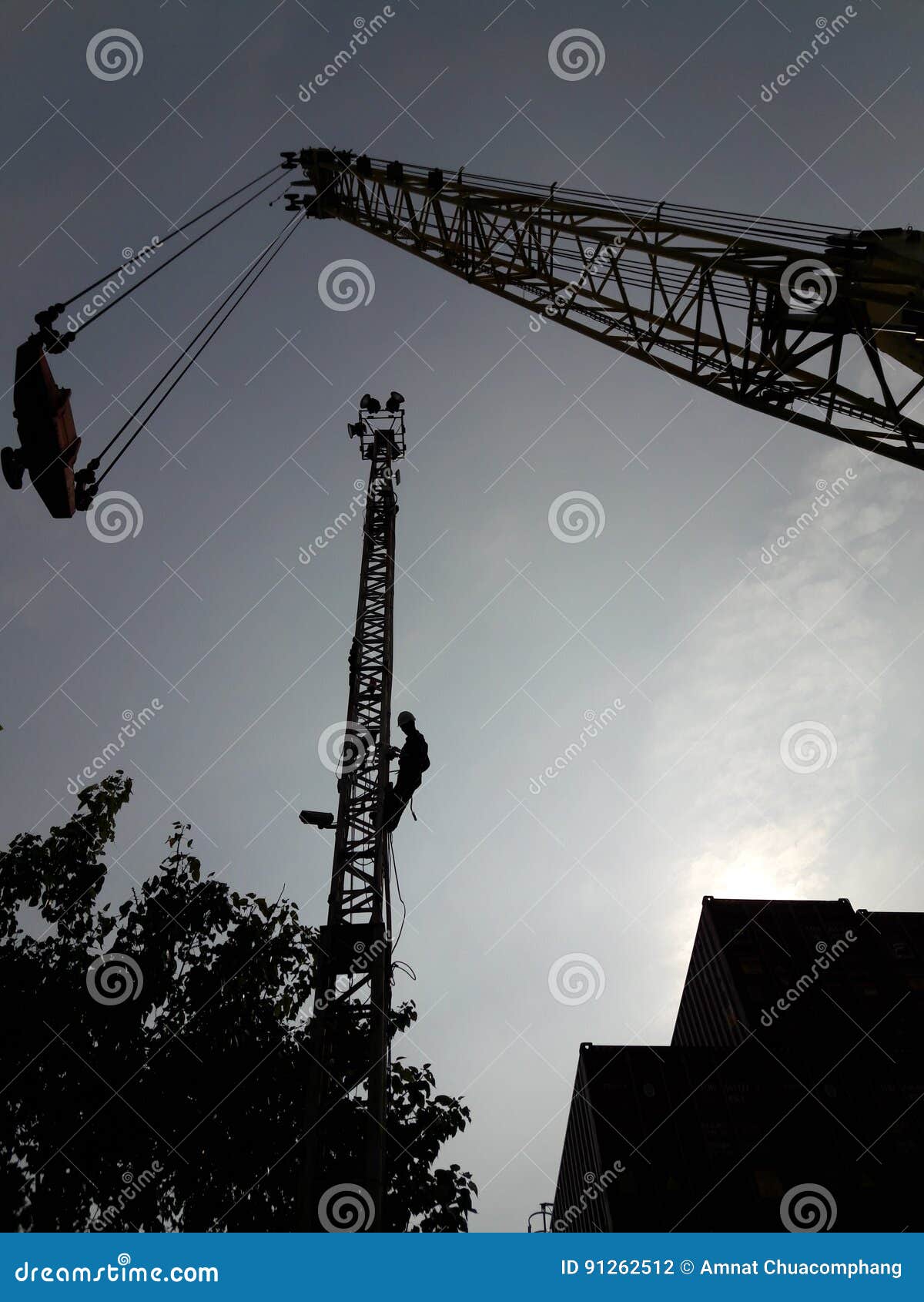Man on high mast lighting stock photo. Image of high - 91262512