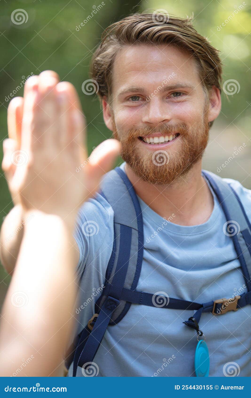 Man Hiker Giving High Five in Forest Stock Image - Image of happy ...