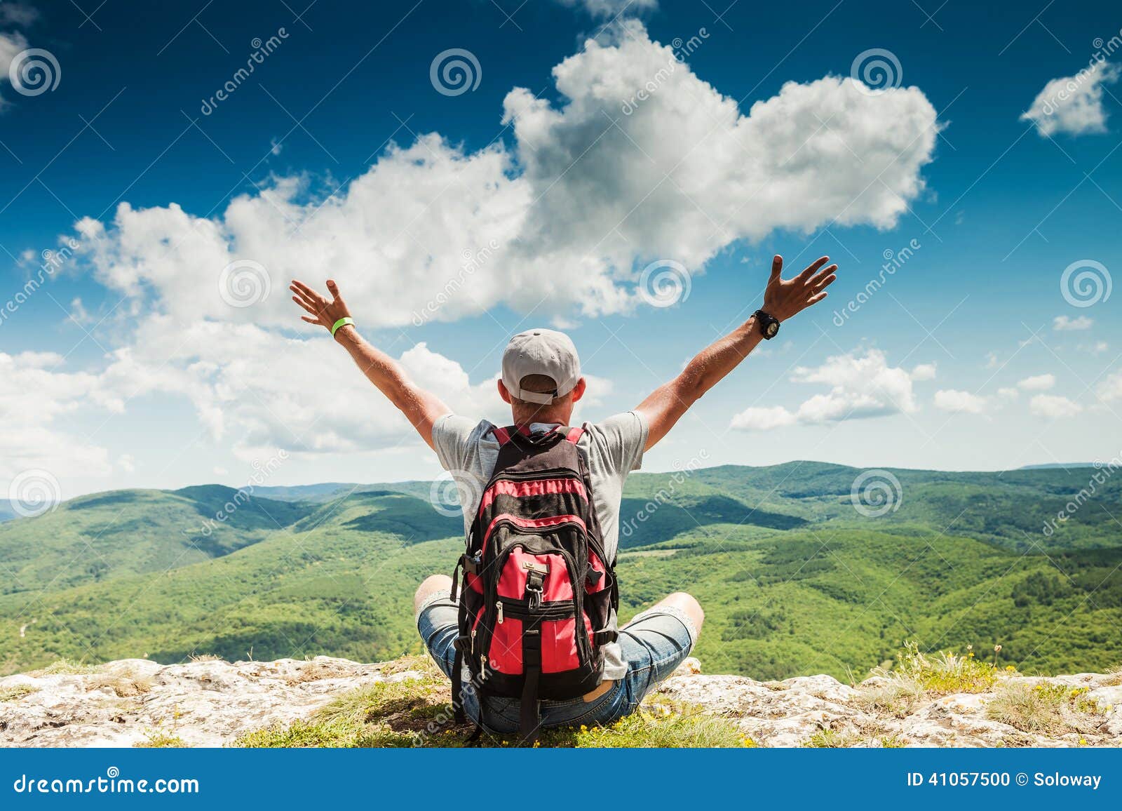 Man Hiker Greeting Rich Nature on the Top of Mountain Stock Photo ...