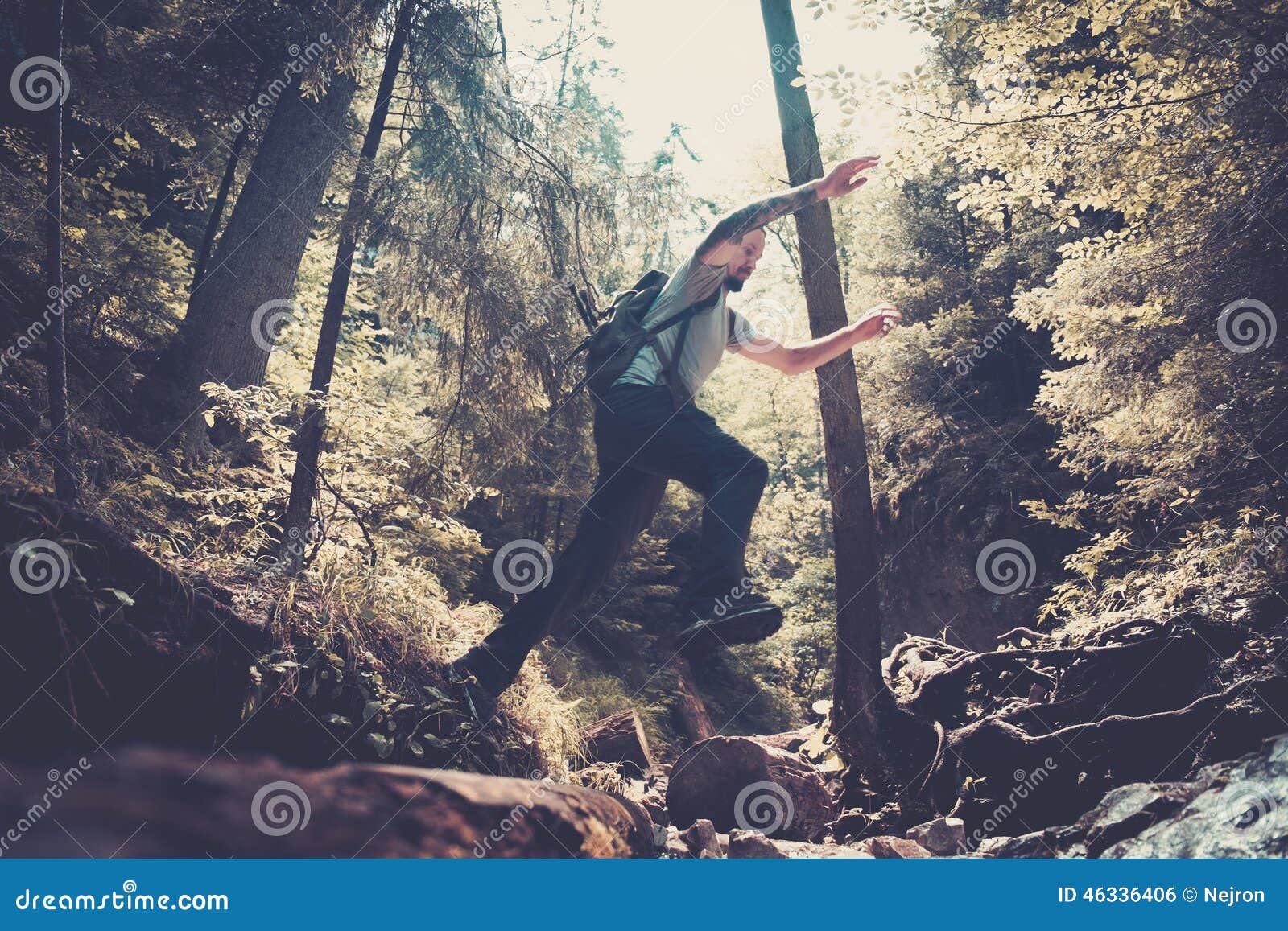 Man Hiker Jumping Across Stream Stock Photo - Image of activity, hiker ...