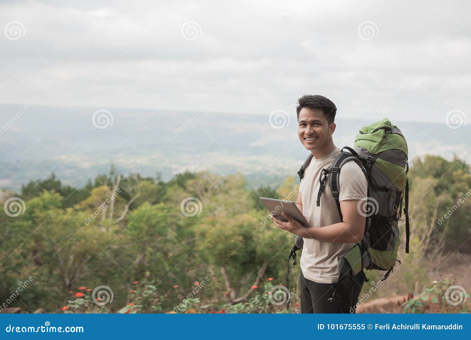 Man hiker using tablet pc stock image. Image of adventurer - 101675555