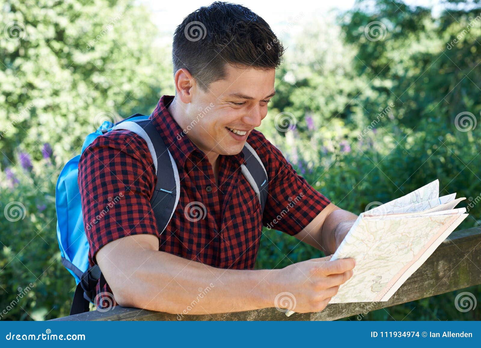 Man Hiking in Countryside with Map Stock Photo - Image of healthy ...