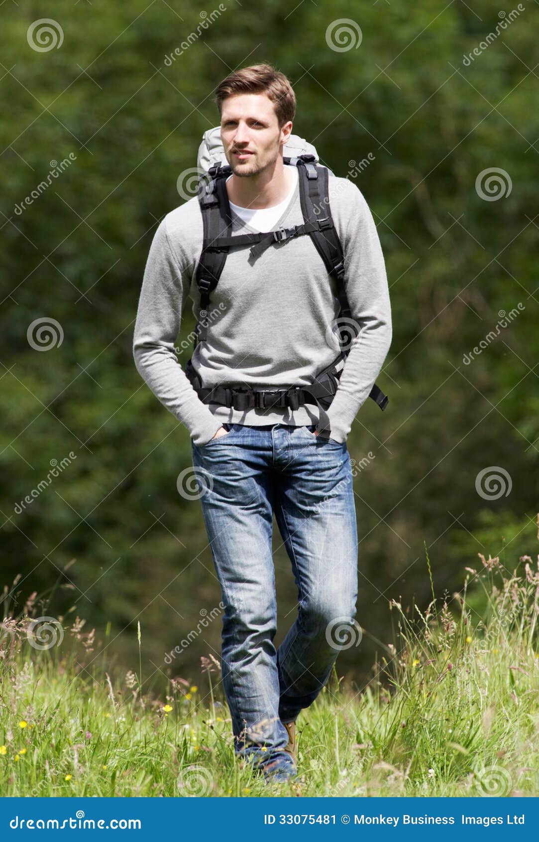 Man Hiking in Countryside stock image. Image of grass - 33075481