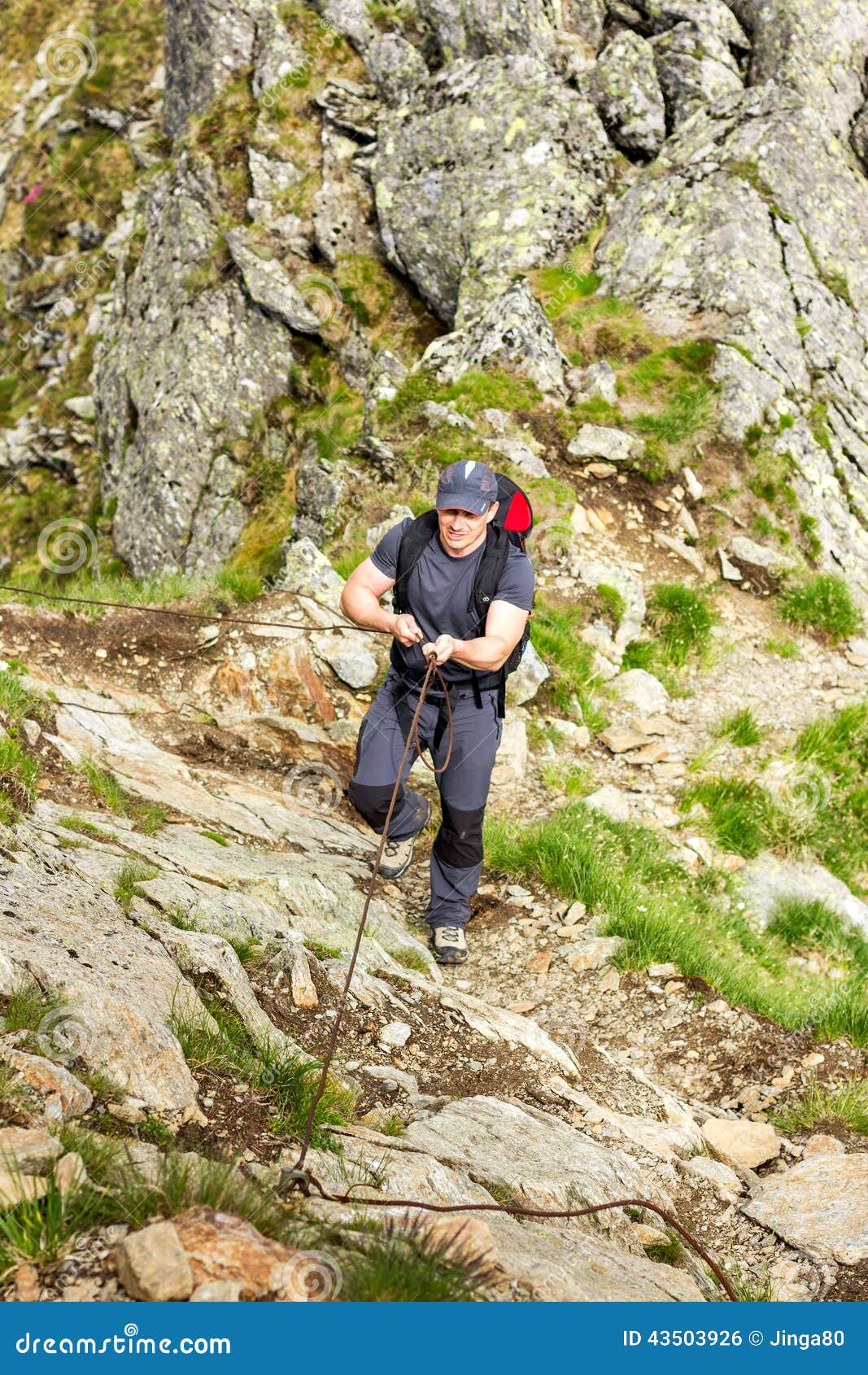 Man Hiking on Difficult Mountain Trail with Hanging Cable Stock Photo ...