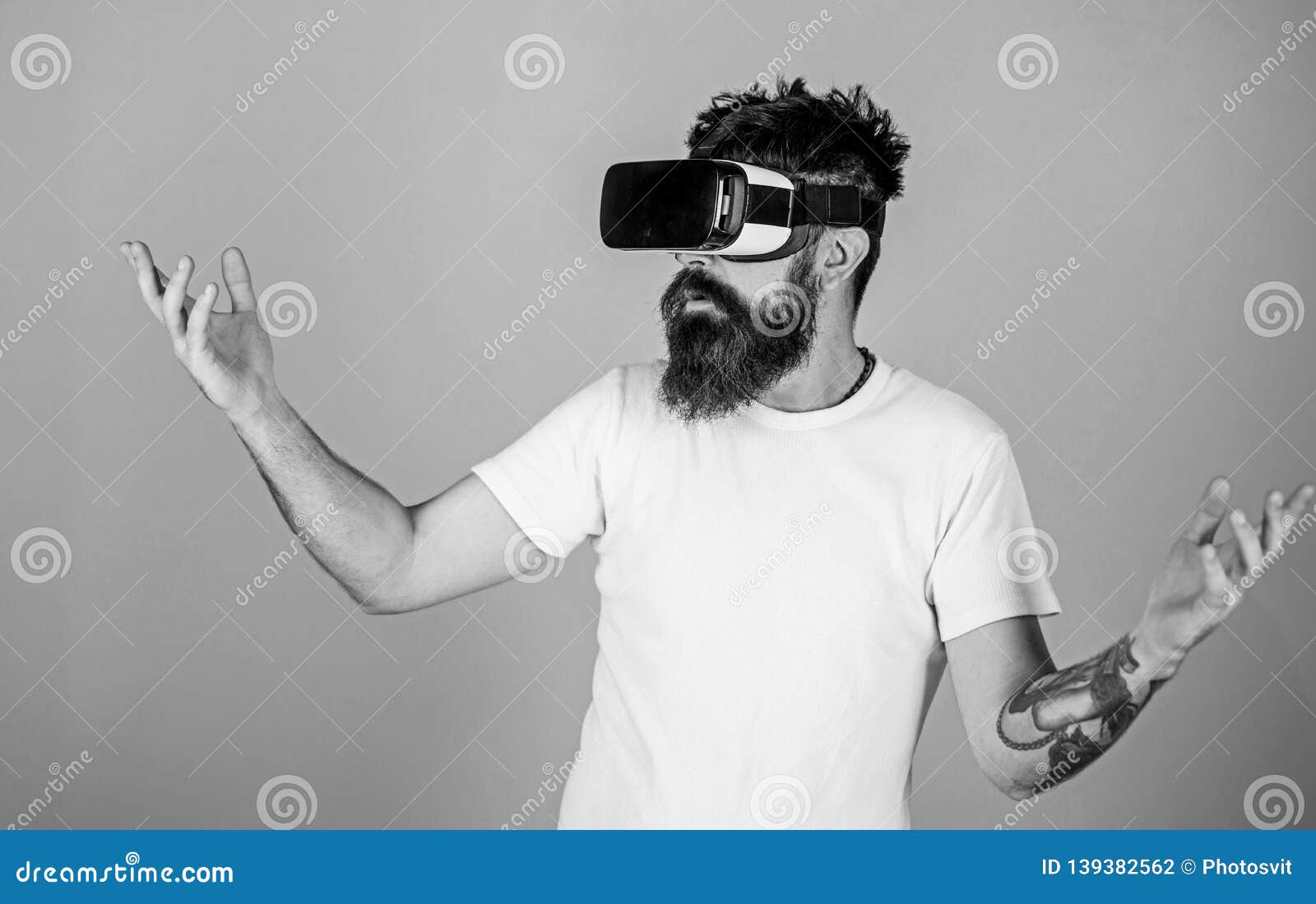 Man with Hipster Beard in VR Goggles Impressed by Multidimensional ... Man with Hipster Beard in VR Goggles Impressed by Multidimensional ...