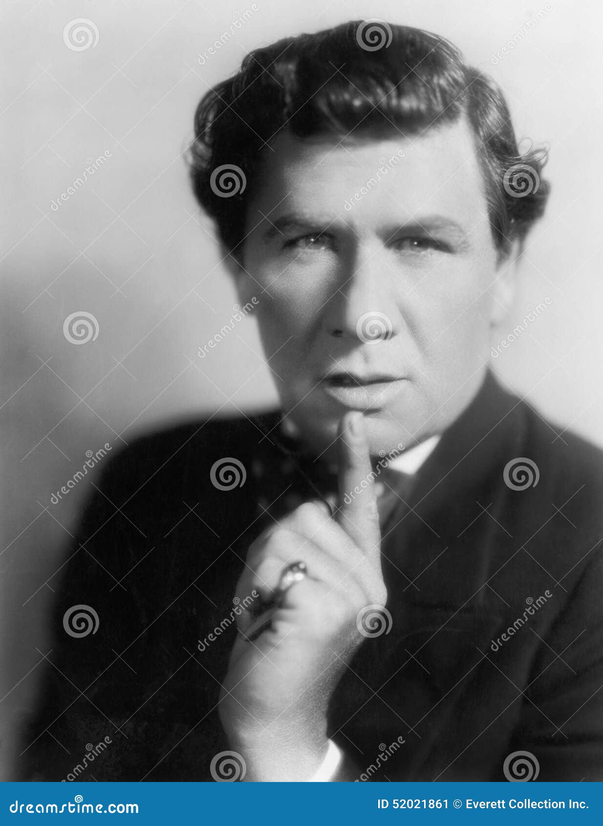 Man with His Finger on His Chin Looking Quizzical Stock Image - Image ...