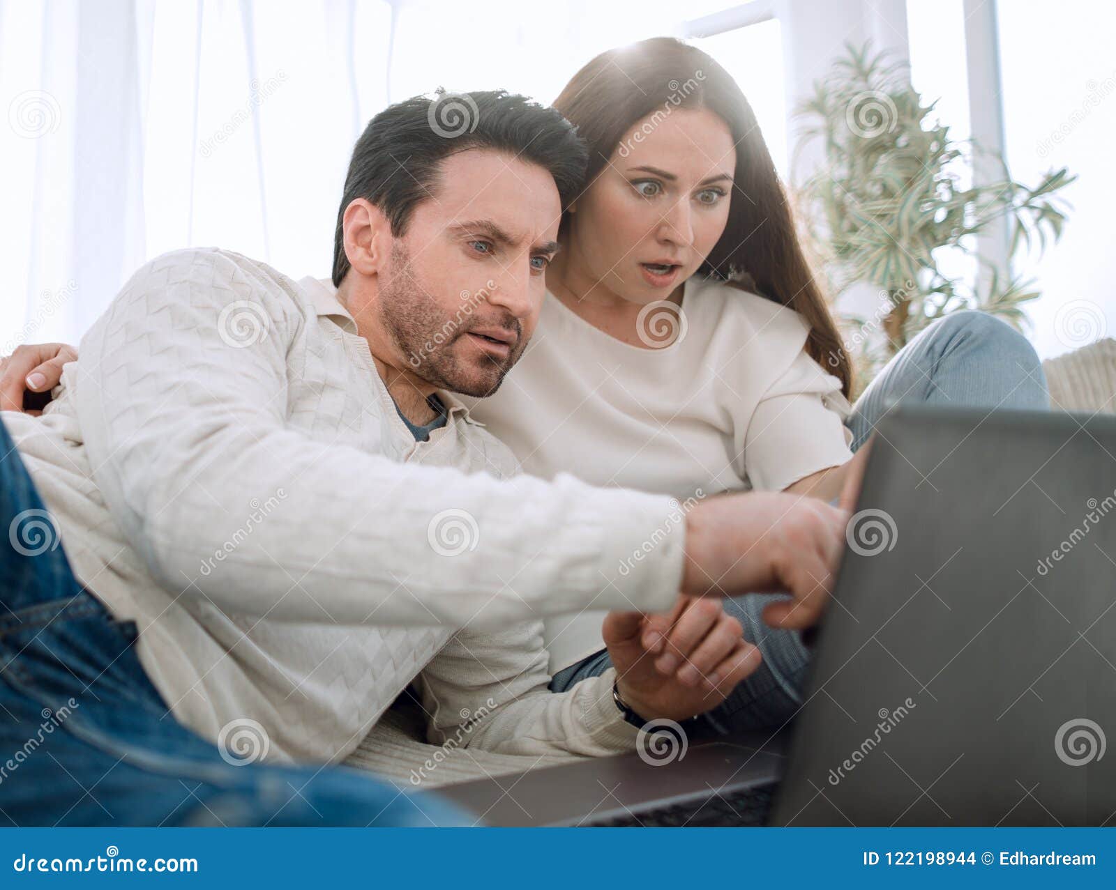 Man with His Girlfriend Chatting on Laptop at Home Indoor Stock Photo ... Man with His Girlfriend Chatting on Laptop at Home Indoor Stock Photo ...