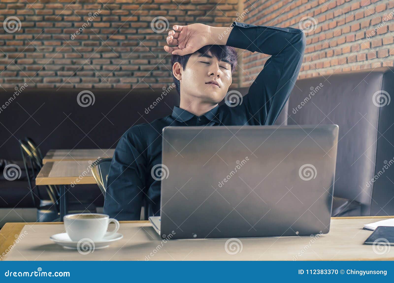 Man with His Hand Holding His Face Taking a Brake from Working Stock ...