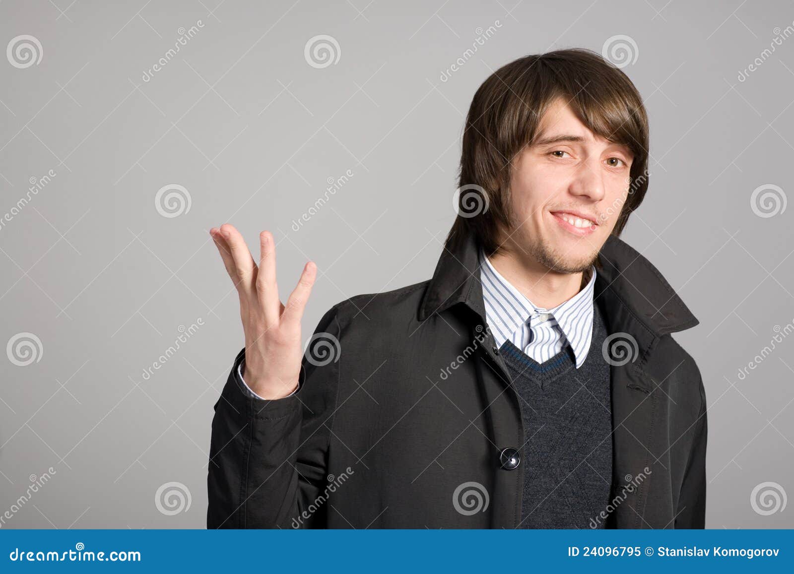 Man with his hand raised stock image. Image of brunet - 24096795
