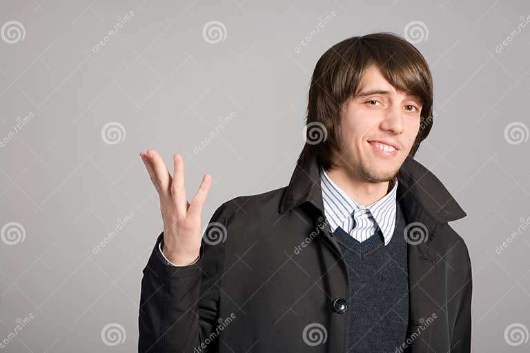 Man with his hand raised stock image. Image of brunet - 24096795