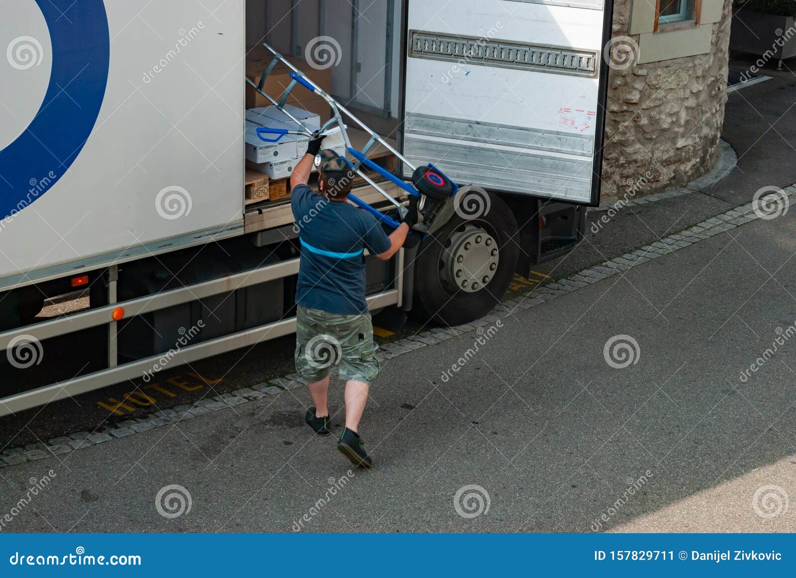 Man on his job with truck editorial photo. Image of hardwork - 157829711