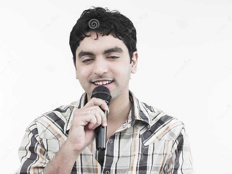 Man with his mike singing stock image. Image of isolated - 7320999