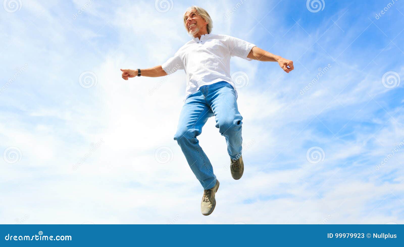 Man in His 50s Jumping High Stock Image - Image of white, blue: 99979923