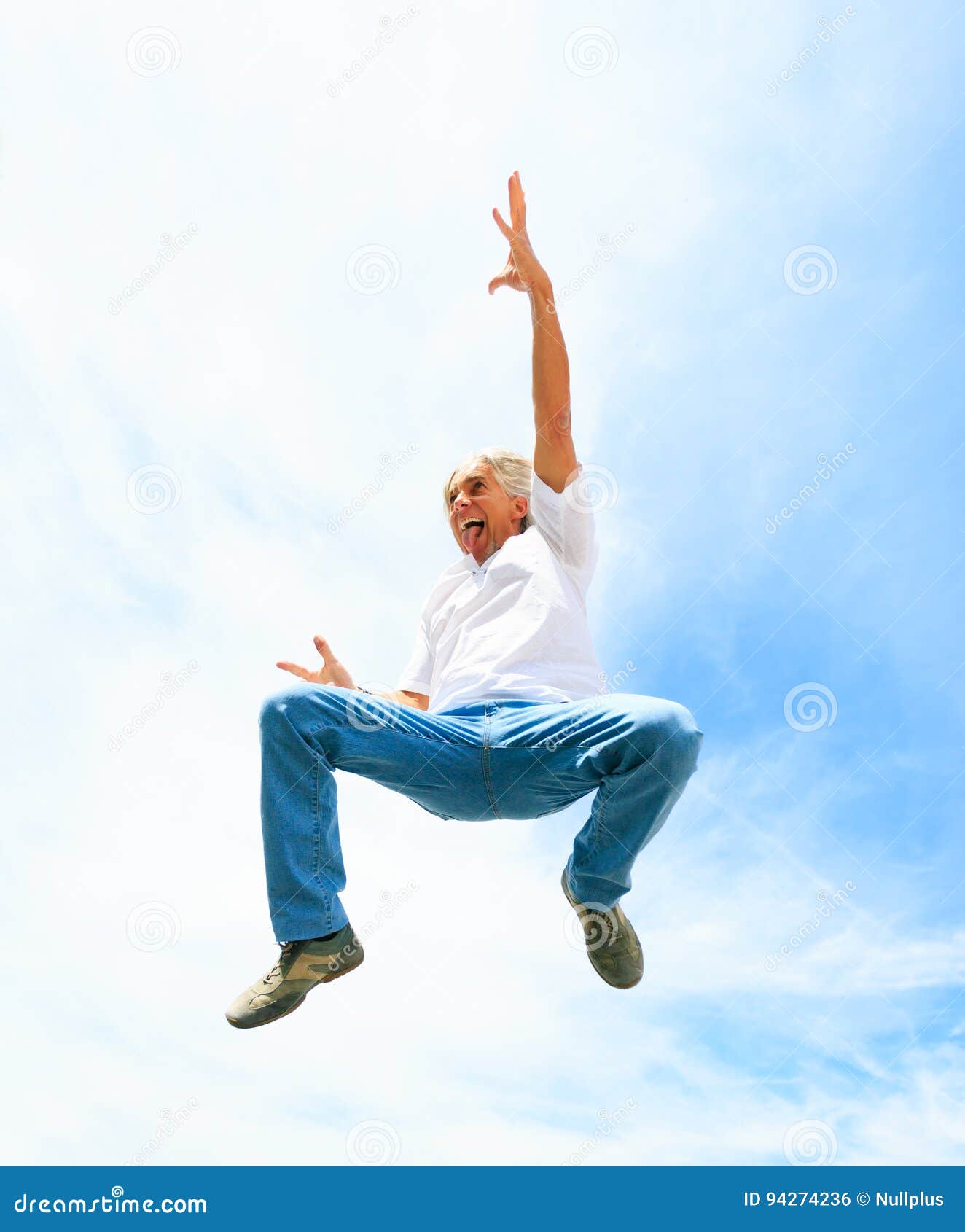 Man in His 50s Jumping High Stock Photo - Image of active, sports: 94274236