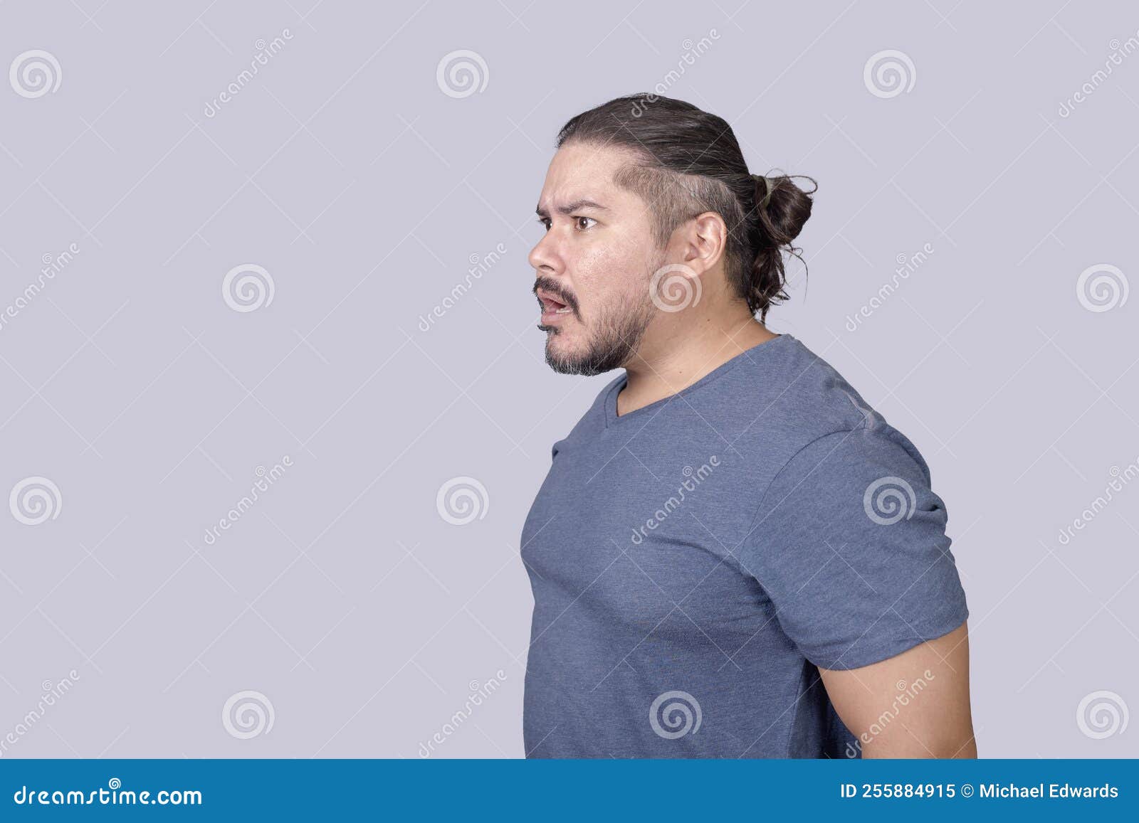 A Man in His 30s Puzzled and Flabbergasted while Looking at Something ...