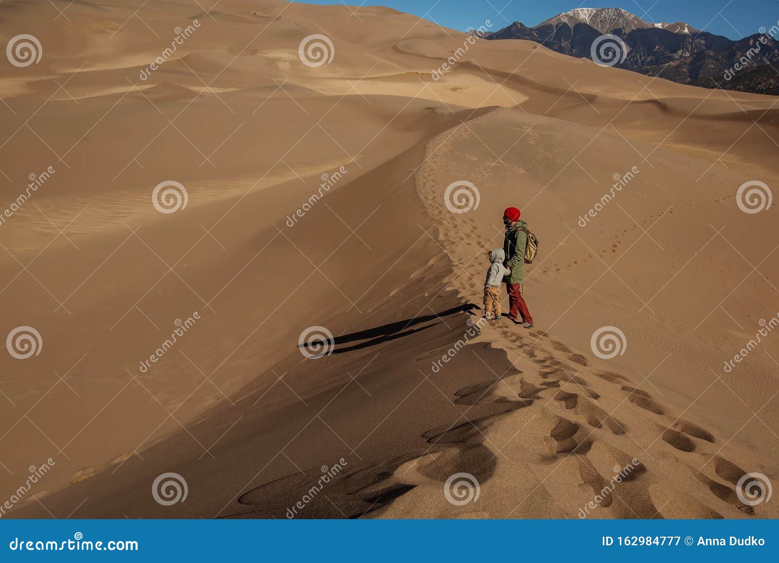 A Man with His Son are Hiking in Desert Stock Image - Image of walking ...