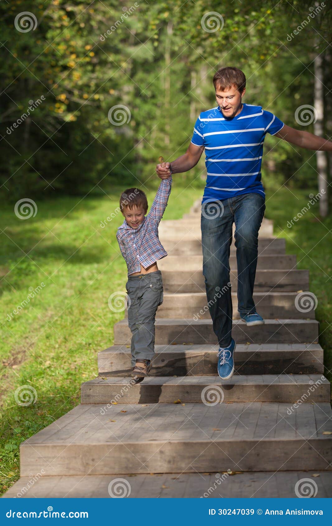 Father and son in a jump stock image. Image of jump, road - 30247039