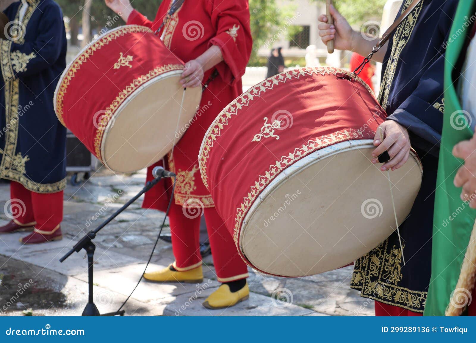 A Man Hit the Ancient Drum with Musical Instrument. Stock Photo - Image ...