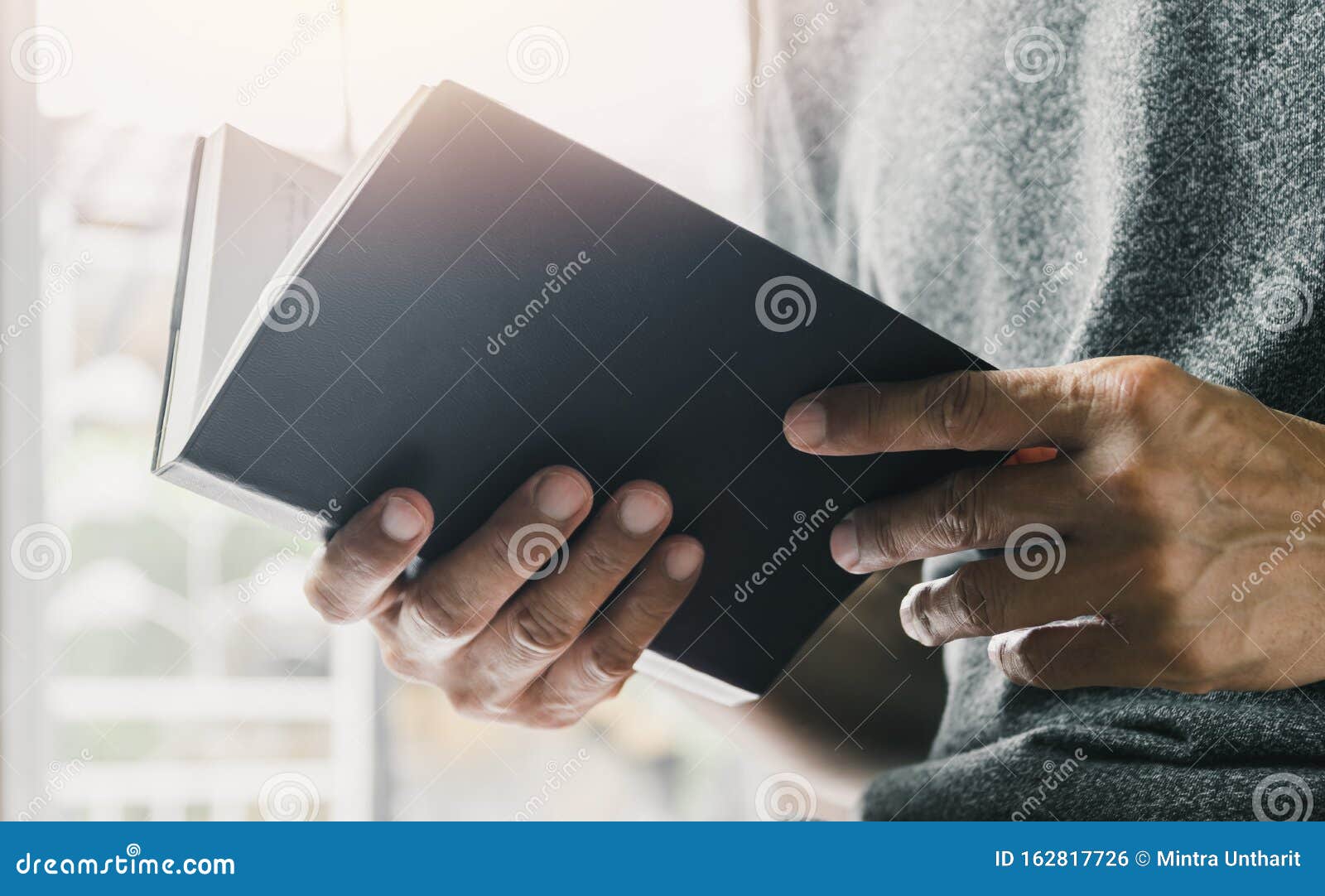Man Hold a Book for Reading To Get Knowledge Stock Photo - Image of ...