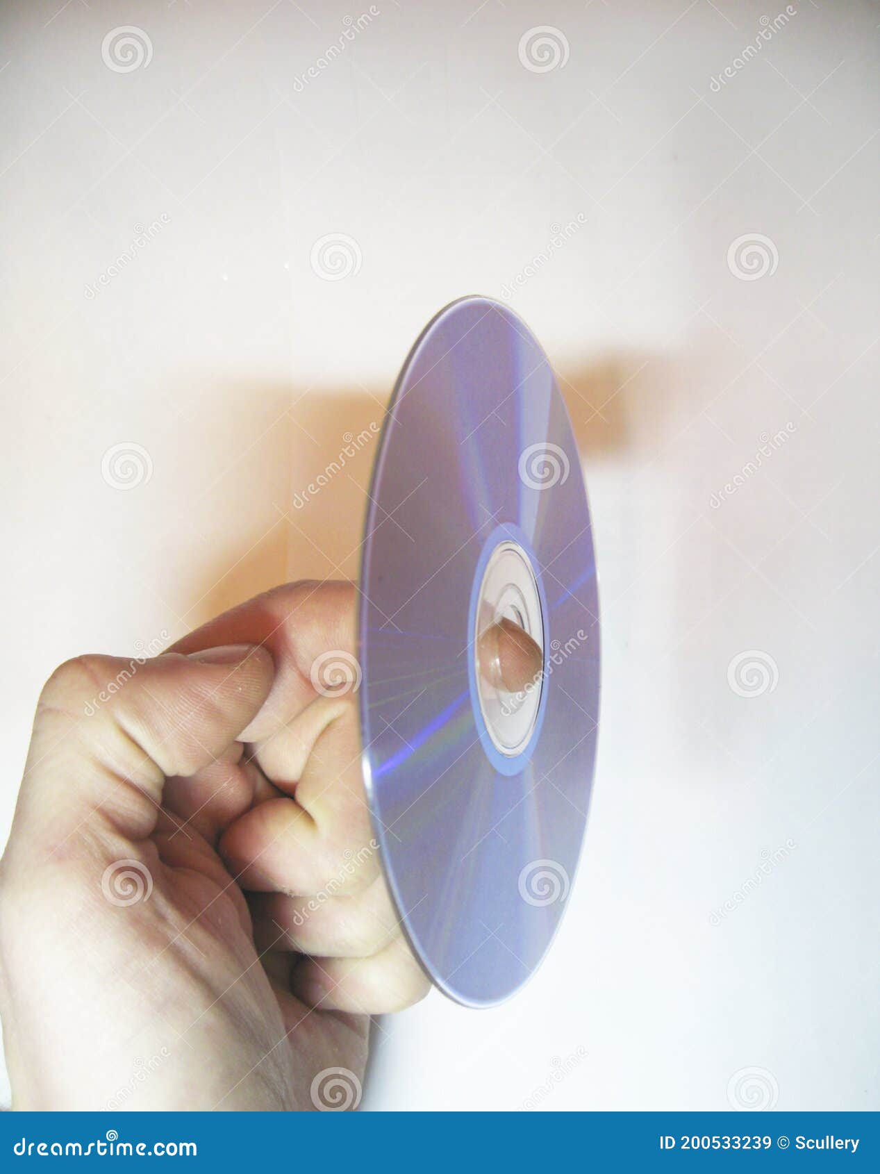 Man Hold on the Finger Compact Disk Isolated on the White Stock Image ...