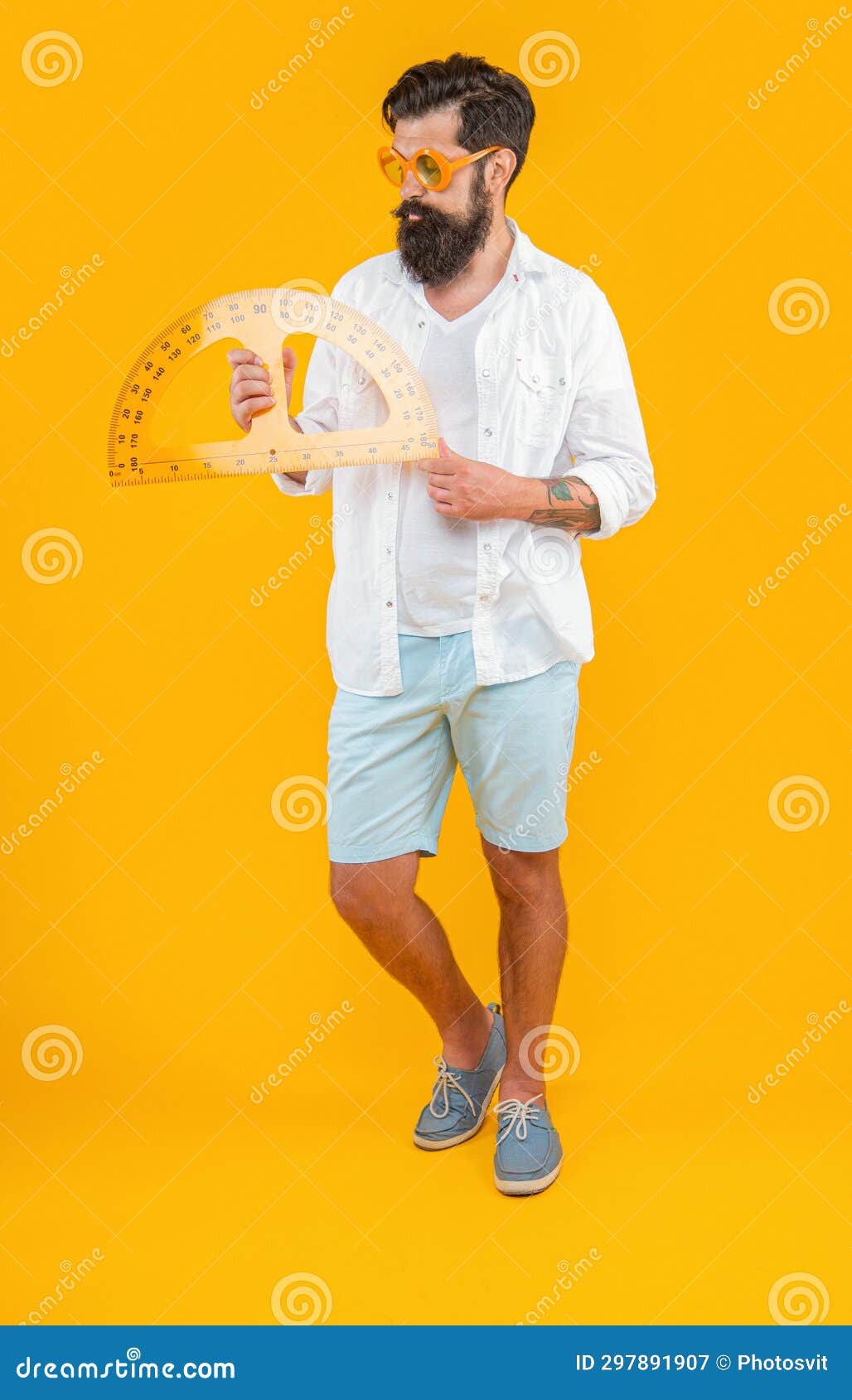 Man Hold Geometry Protractor Isolated on Yellow. Man Hold Geometry ...