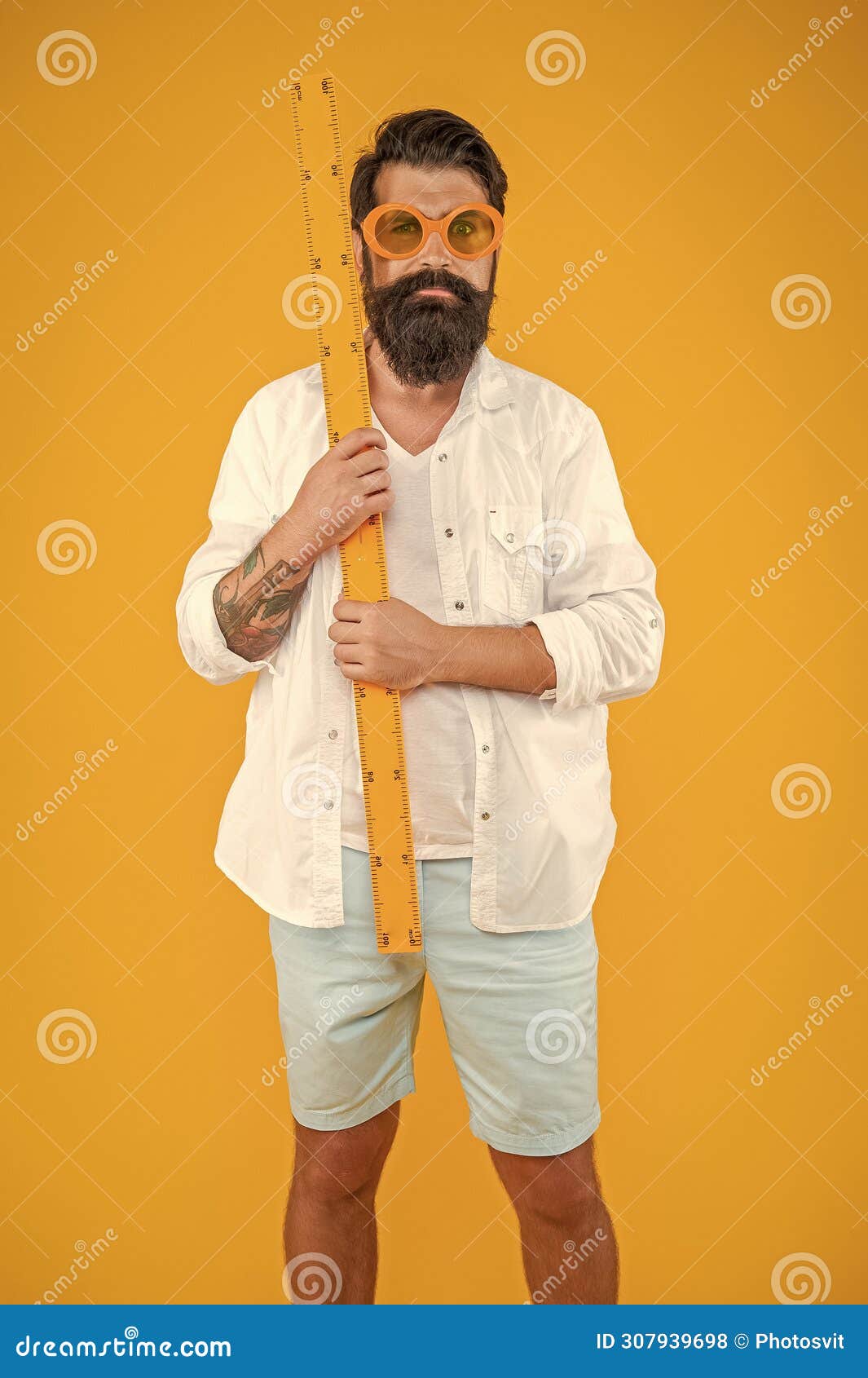 Man Hold Measuring Ruler Isolated on Yellow. Man Hold Measuring Ruler ...