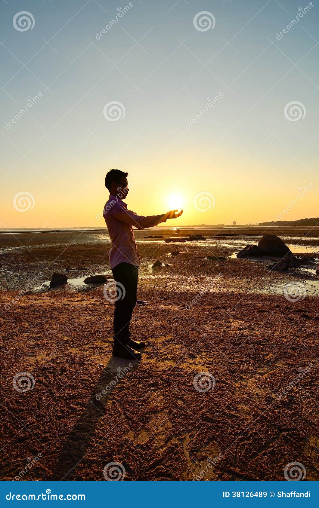 Man Hold the Sun Using His Hand Stock Image - Image of body, sunset ...