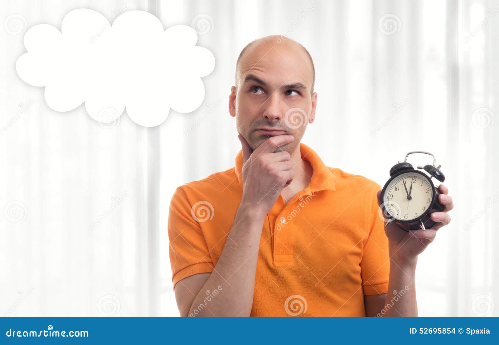 Man Holding Alarm Clock, Thinking And Looking Up Stock Photo - Image ...