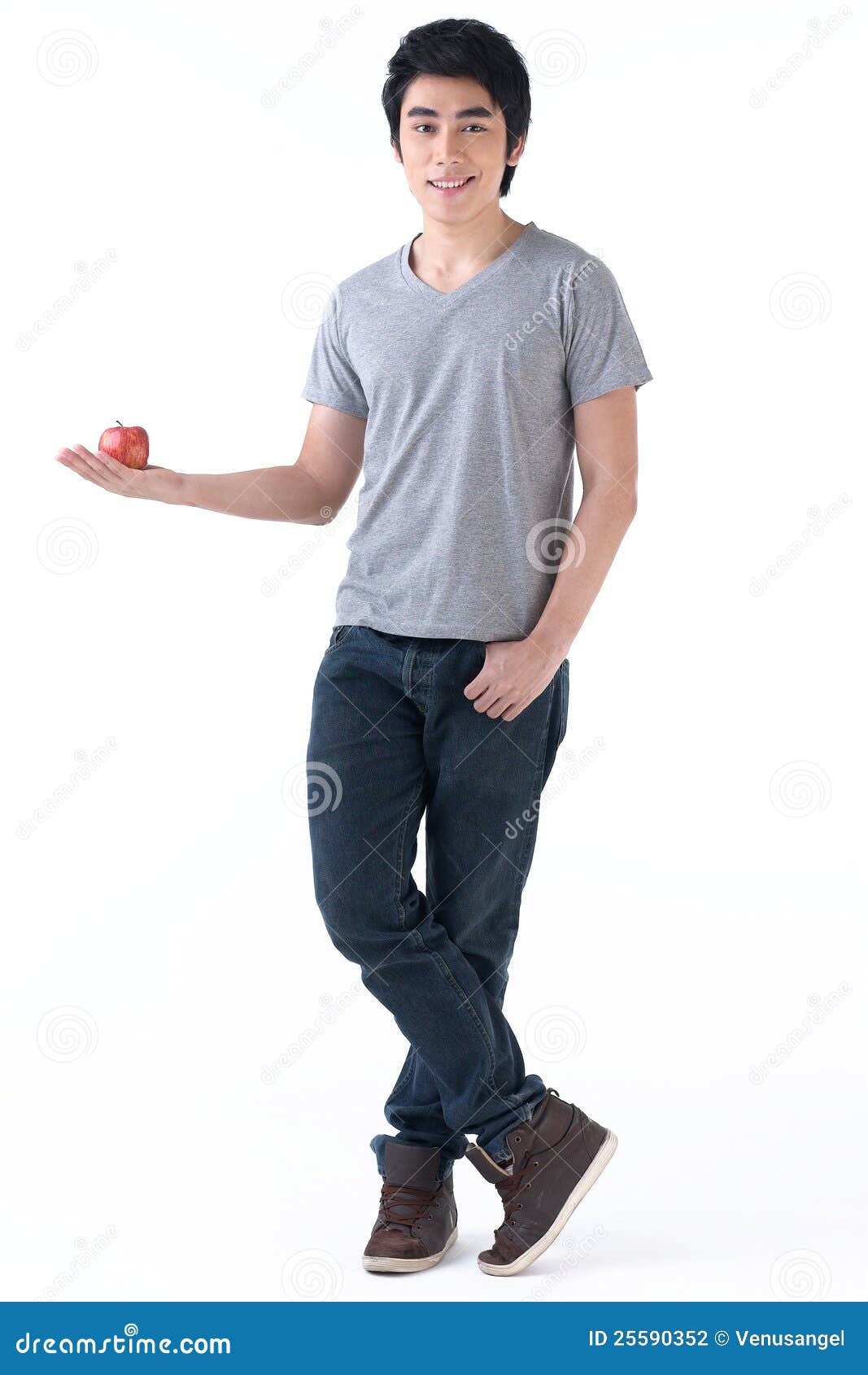 A man holding an apple stock photo. Image of posing, background - 25590352