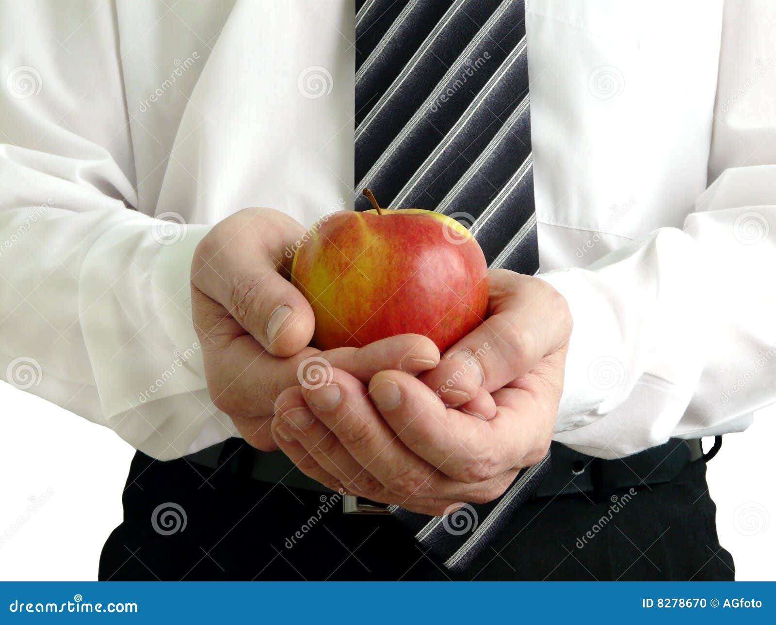 Man holding apple in hands stock photo. Image of person - 8278670