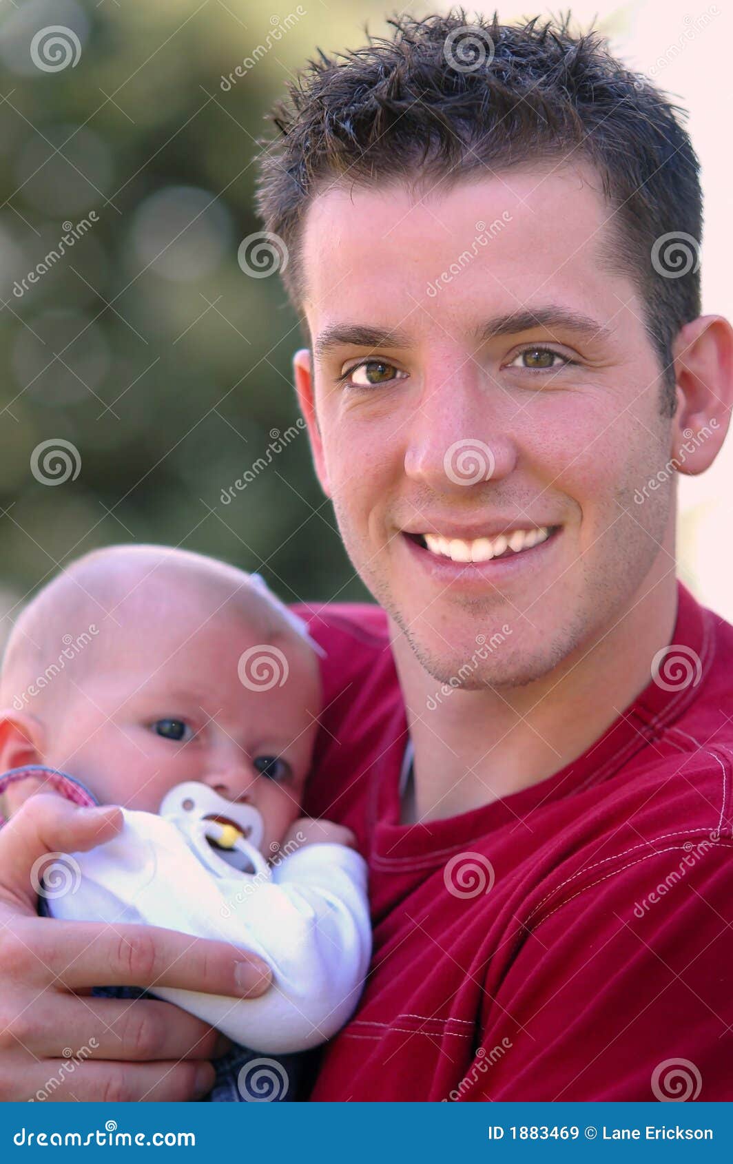 Man Holding a Baby stock image. Image of smile, happy - 1883469