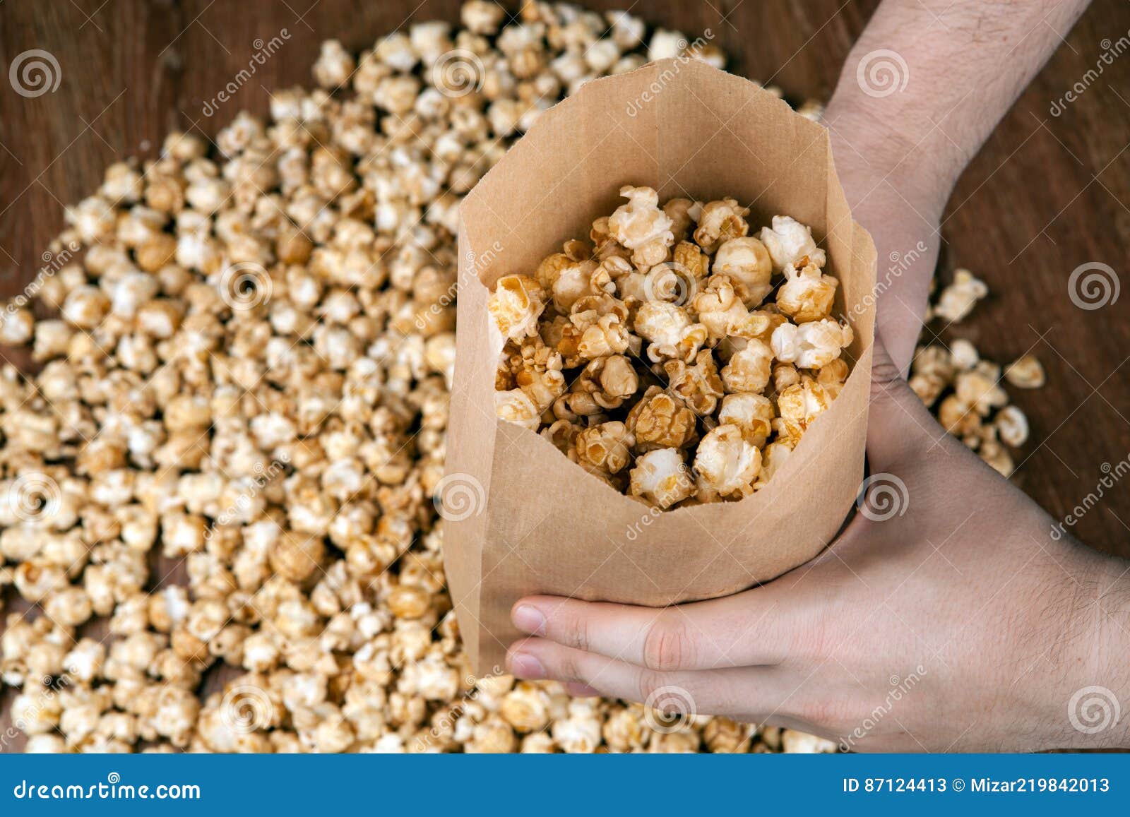 Man Holding a Bag of Popcorn Stock Image - Image of roasted, fastfood ...