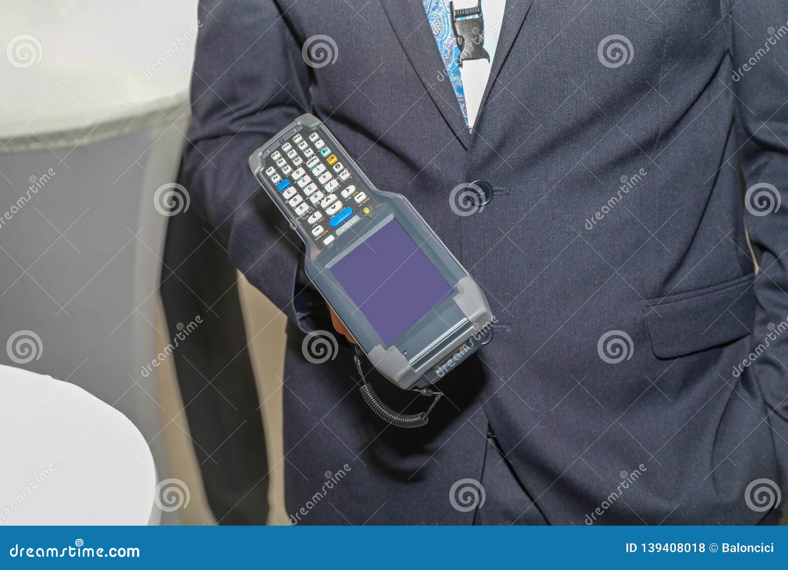 Man Holding Barcode Reader stock photo. Image of control - 139408018