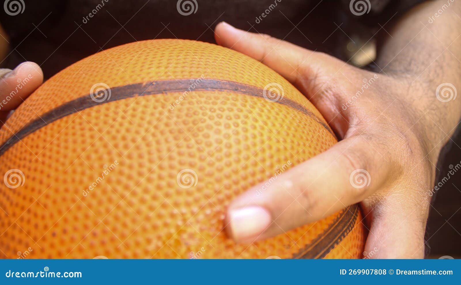 Man Holding a Basketball with Two Hand Stock Photo - Image of ...