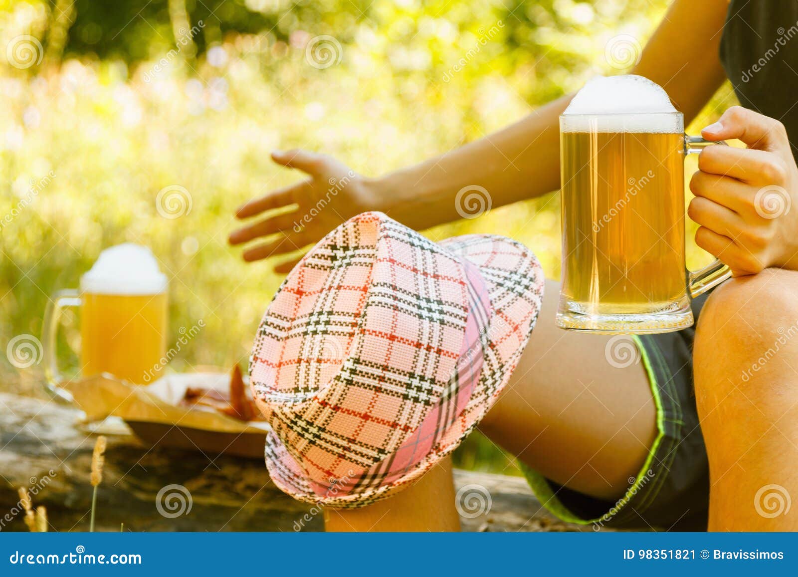 Man holding beer in arm. stock image. Image of alcohol - 98351821