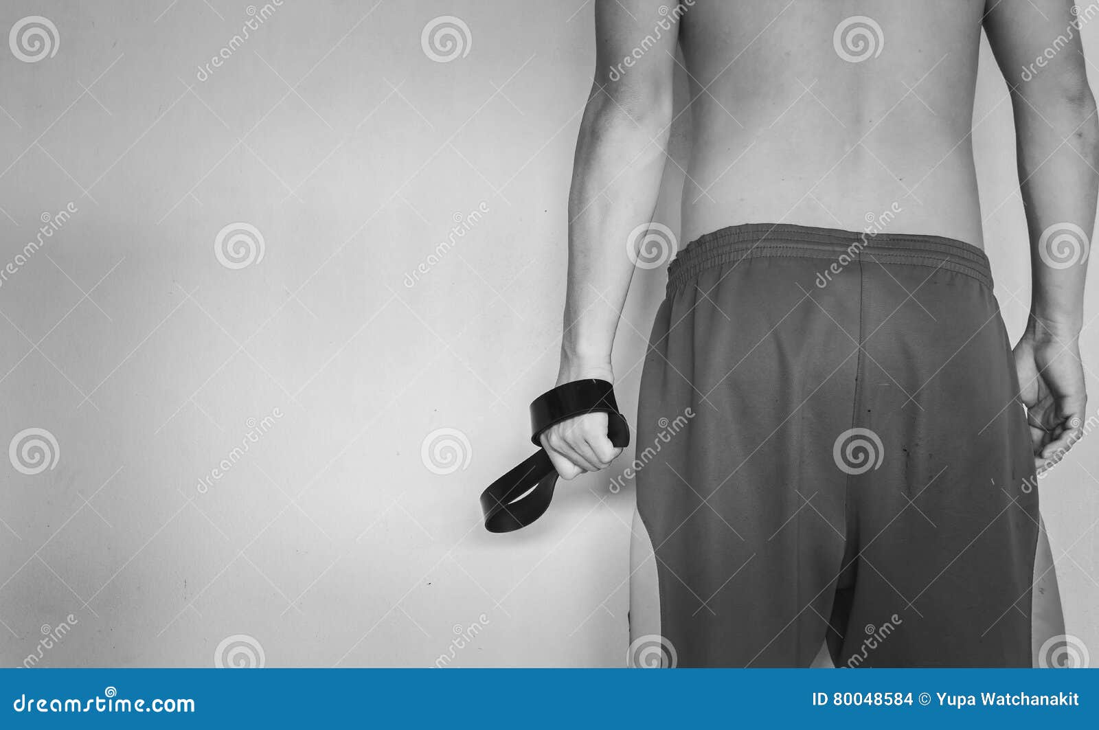 Man holding belt stock photo. Image of hand, childhood - 80048584