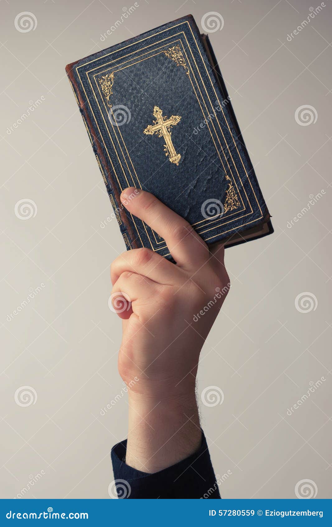 Man Holding a Bible in the Air Stock Image - Image of hand, religious ...