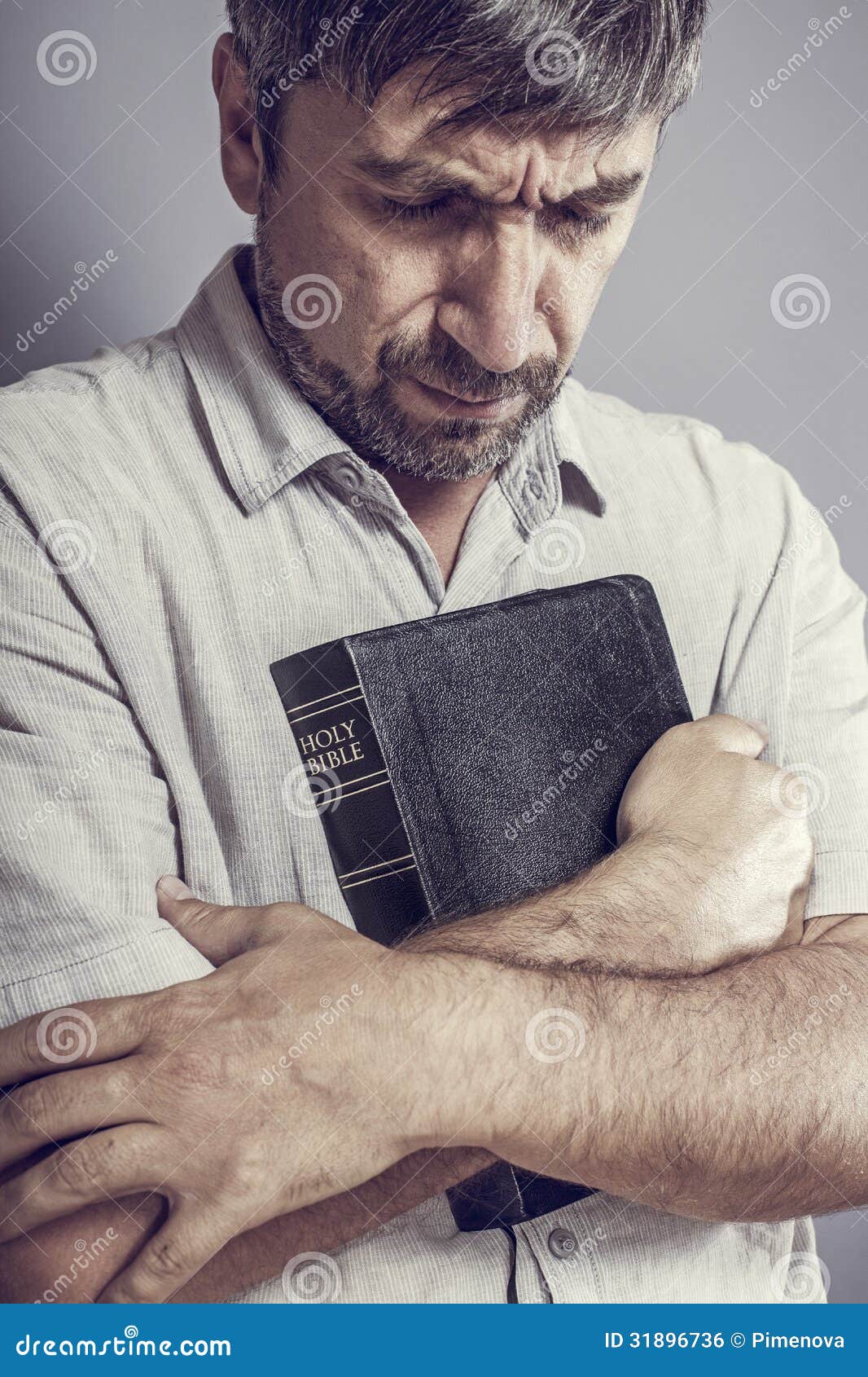 Man holding a bible stock photo. Image of clasped, color - 31896736