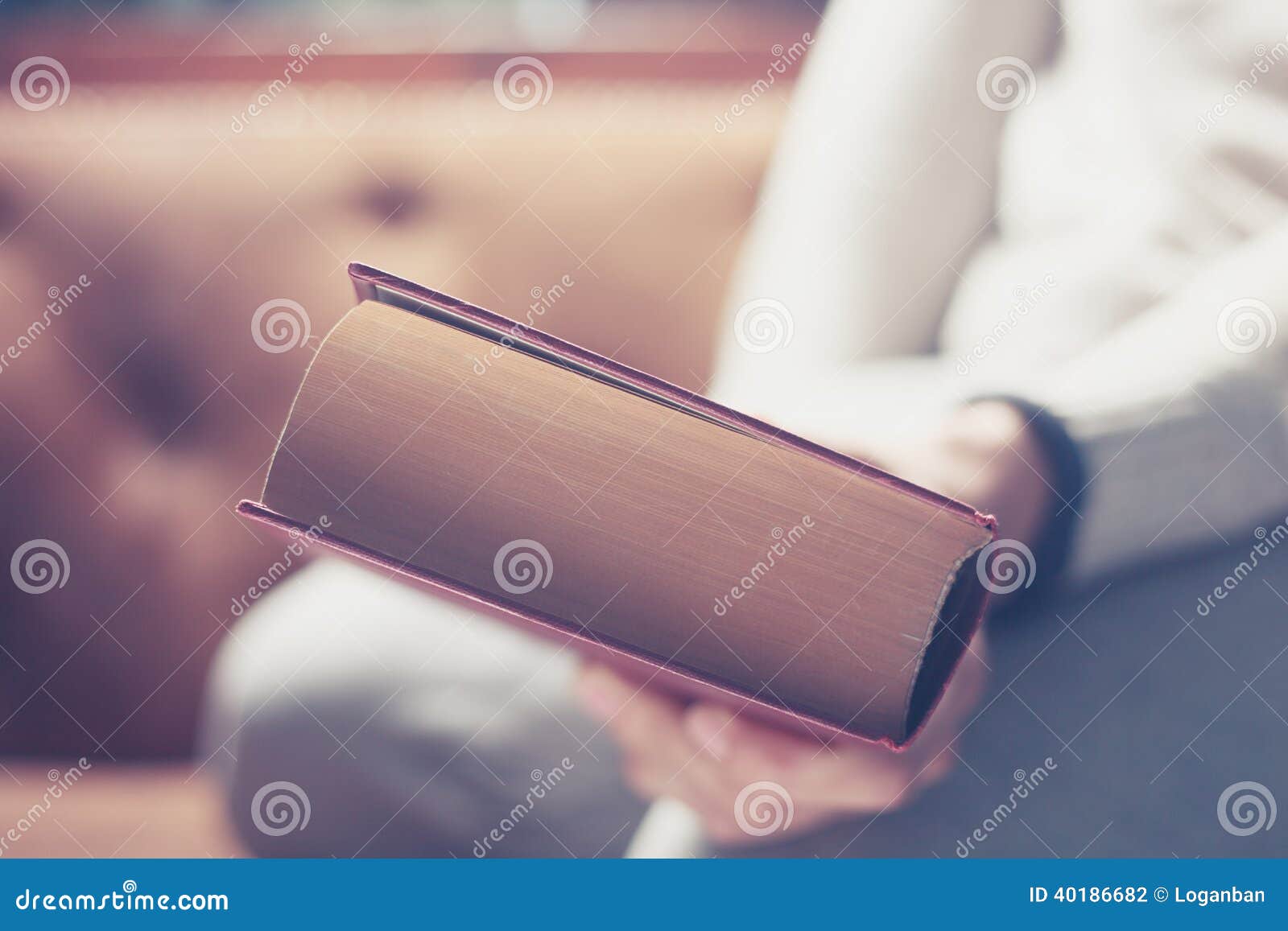 Man holding a big book stock photo. Image of knowledge - 40186682