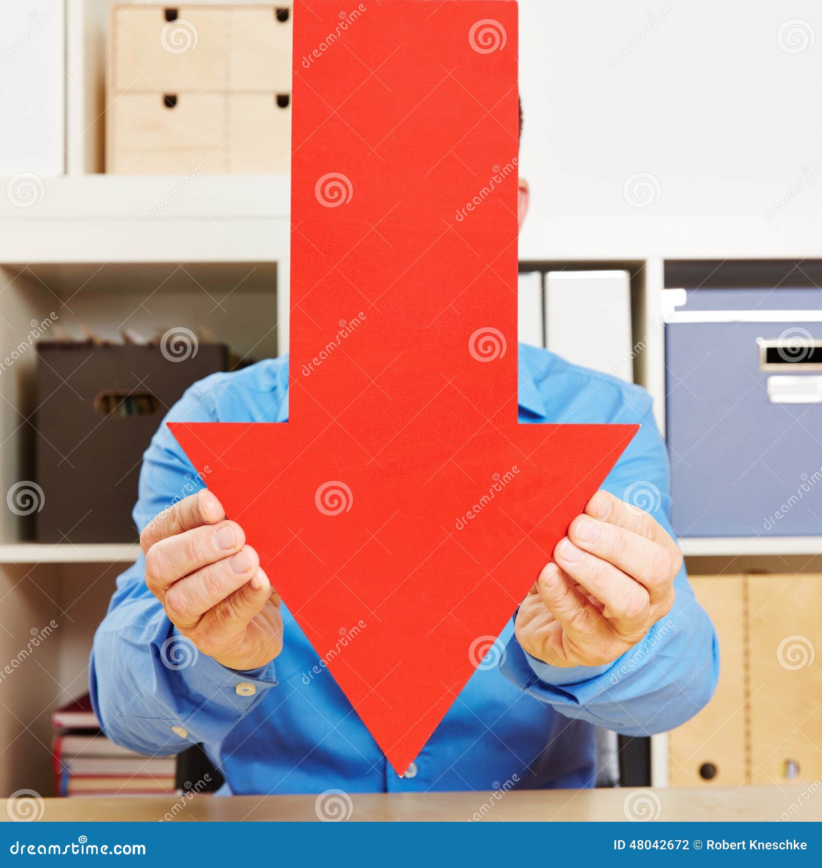 Man Holding Big Red Arrow Down Stock Photo - Image of future, hold ...