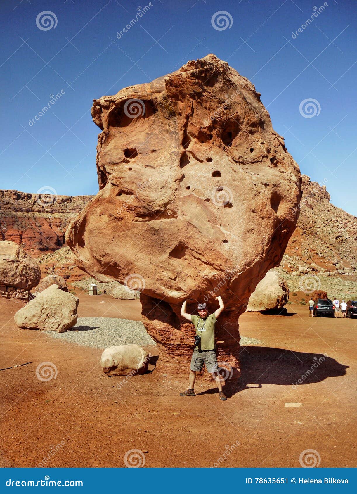 Man holding big stone editorial photo. Image of america - 78635651