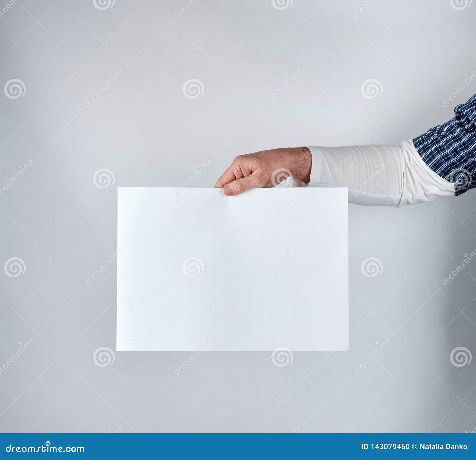 Man Holding a Blank Rectangular White Paper Sheet Stock Photo - Image ...