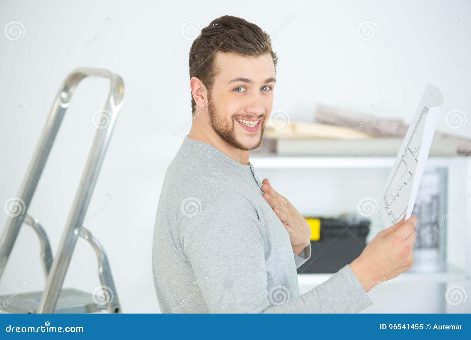 Man Holding Blueprint for Assembling Furniture Stock Image - Image of ...
