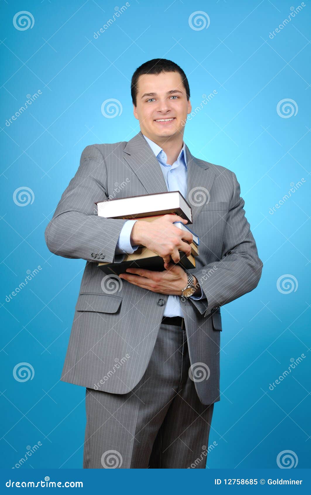 Man Holding Books Royalty Free Stock Photo - Image: 12758685